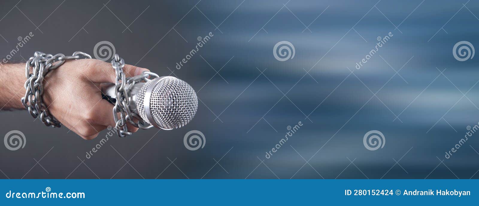 Human Hand Holding Microphone Tied with Chains Stock Photo - Image of ...
