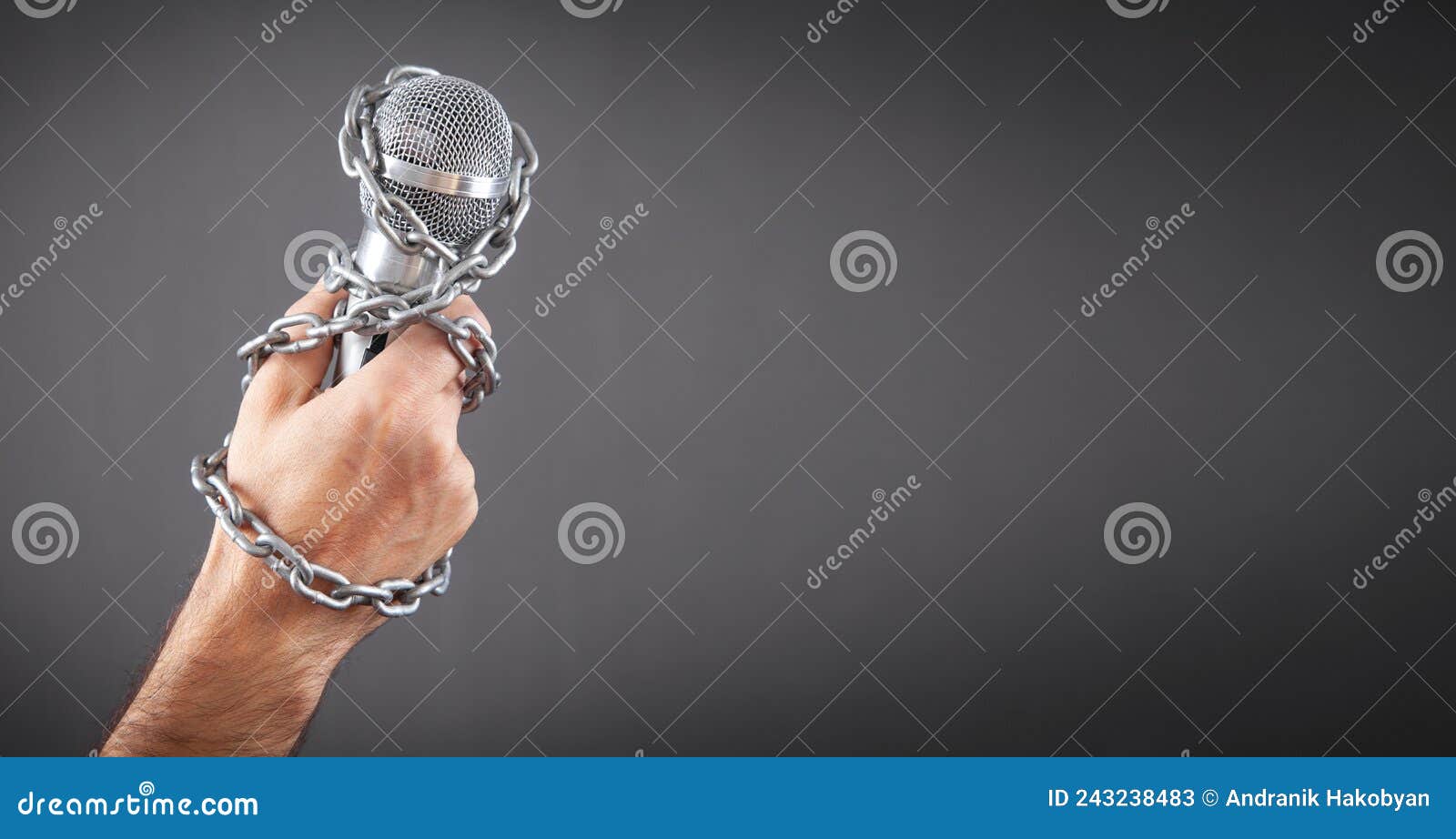 Human Hand Holding Microphone Tied With Chains Stock Image Image Of