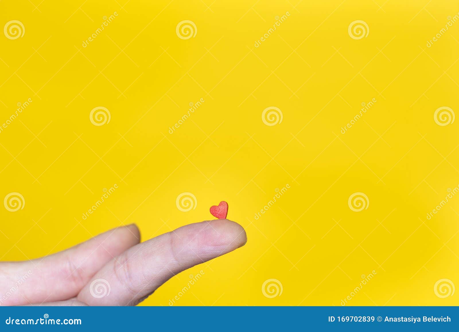 Human Hand Holding One Sweet Candy Heart Stock Image - Image of ...