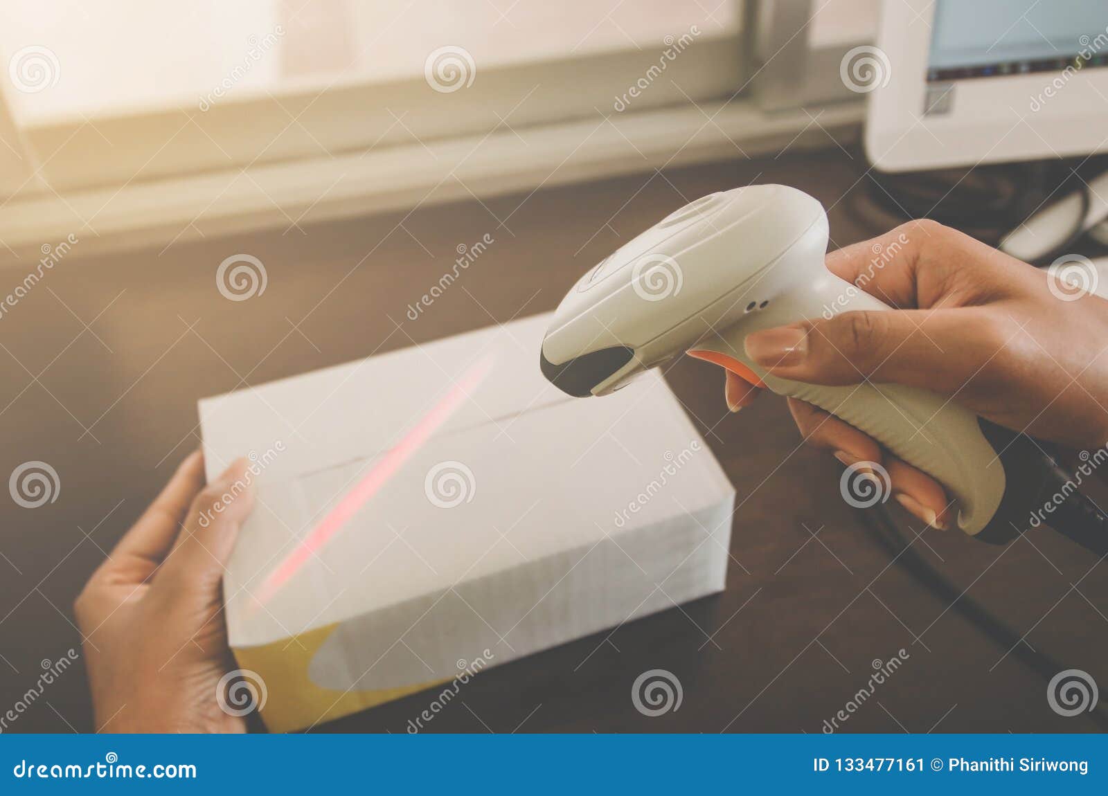 A Human Hand Holding Parcel with Barcode Reader for Delivery Stock ...