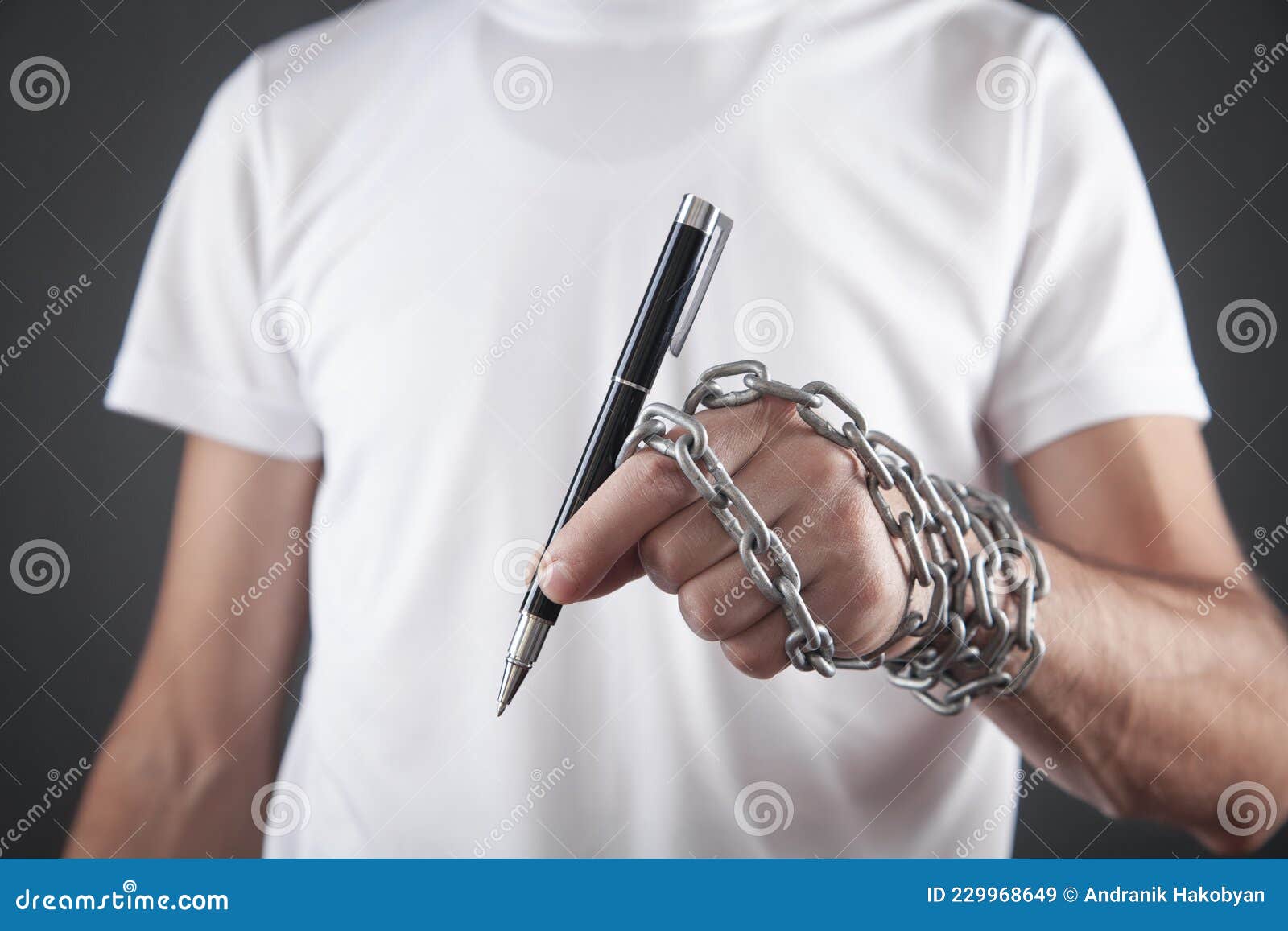 Human Hand Holding Pen Tied with Chains Stock Image - Image of black ...