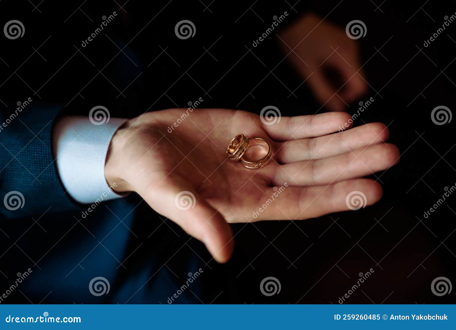 Human Hand Holding a Ring Inside on White Background Stock Image ...