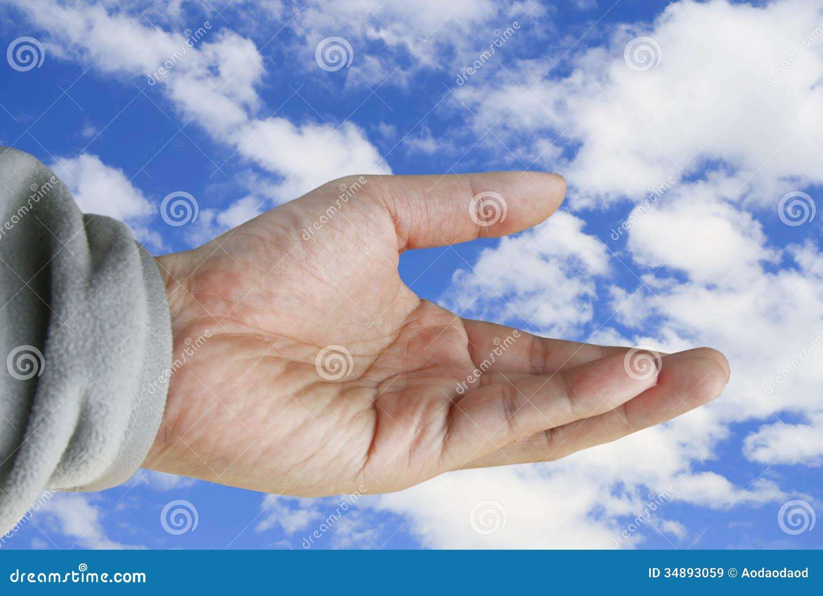 Human hand holding on sky stock image. Image of female - 34893059