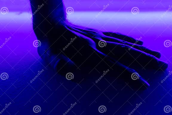 Human hand stock image. Image of hand, violet, darkness - 249549643
