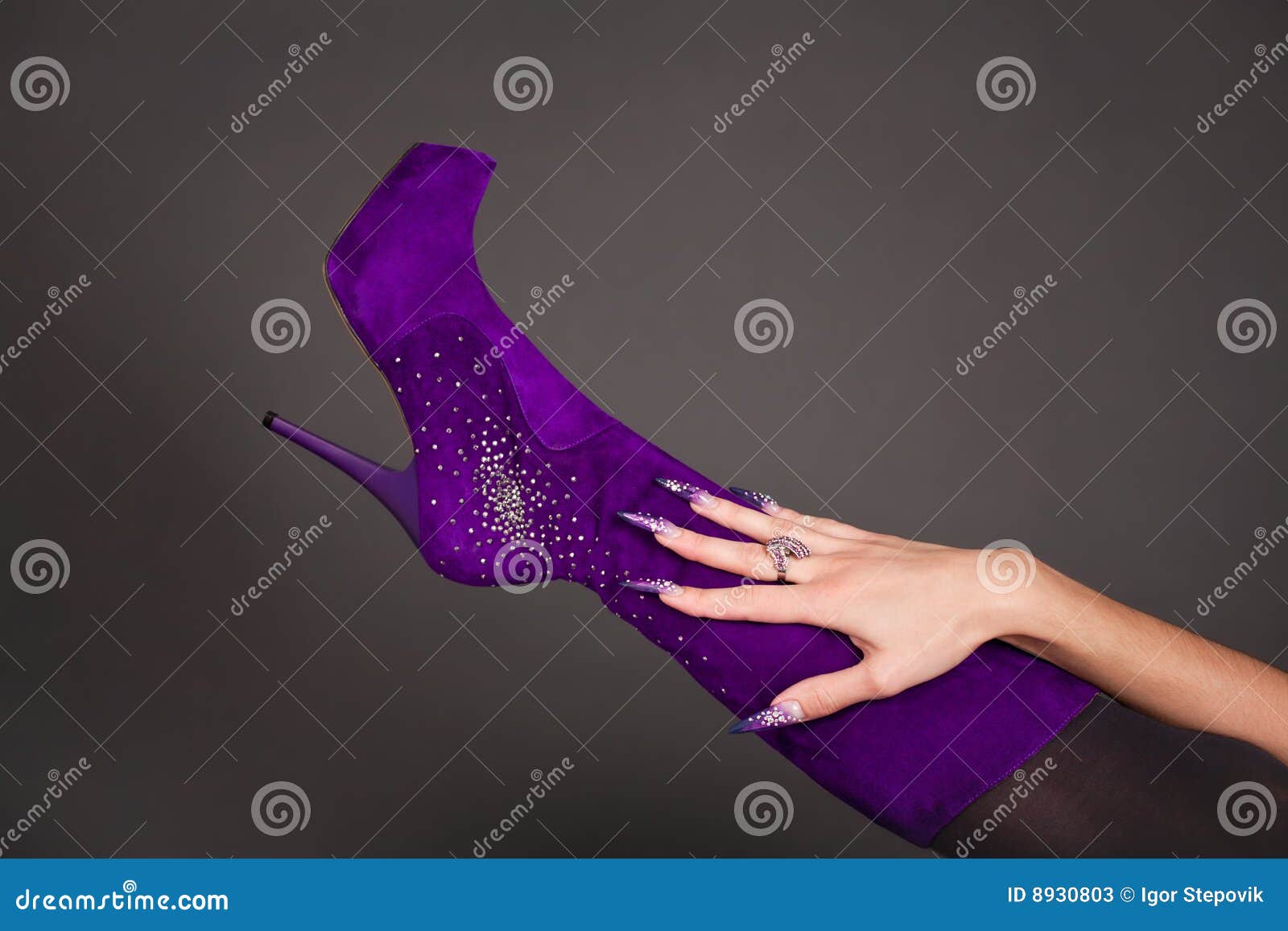 Human Hand with Manicure Touch Purple Boot Stock Image - Image of hands ...