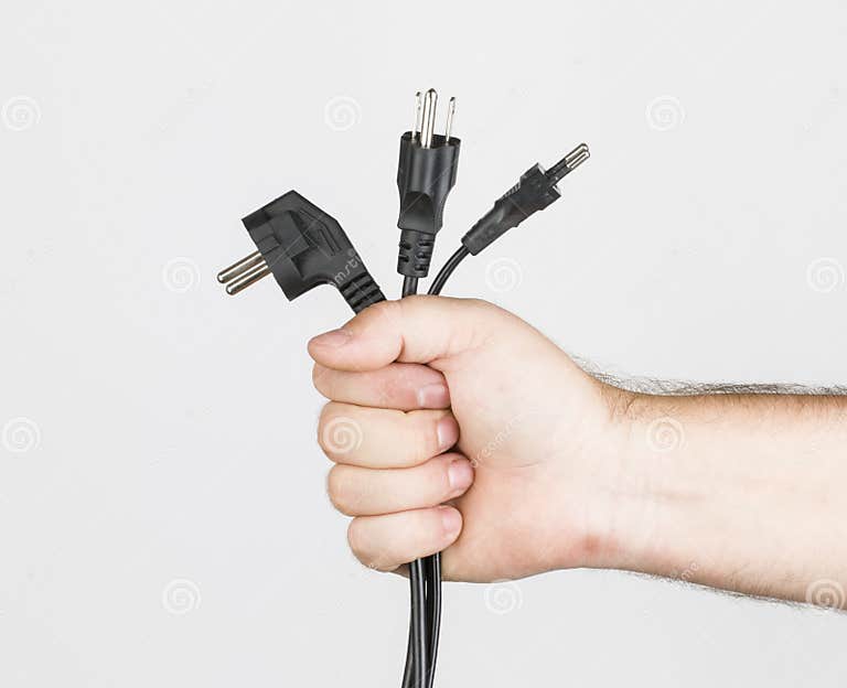 Human hand and plug. stock image. Image of wired, safety - 43740081