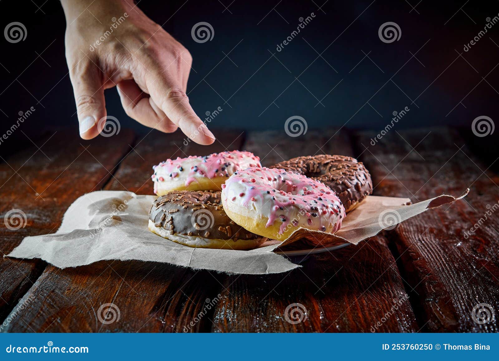 Human Hand Pointing at Donut on the Table Stock Photo - Image of ...