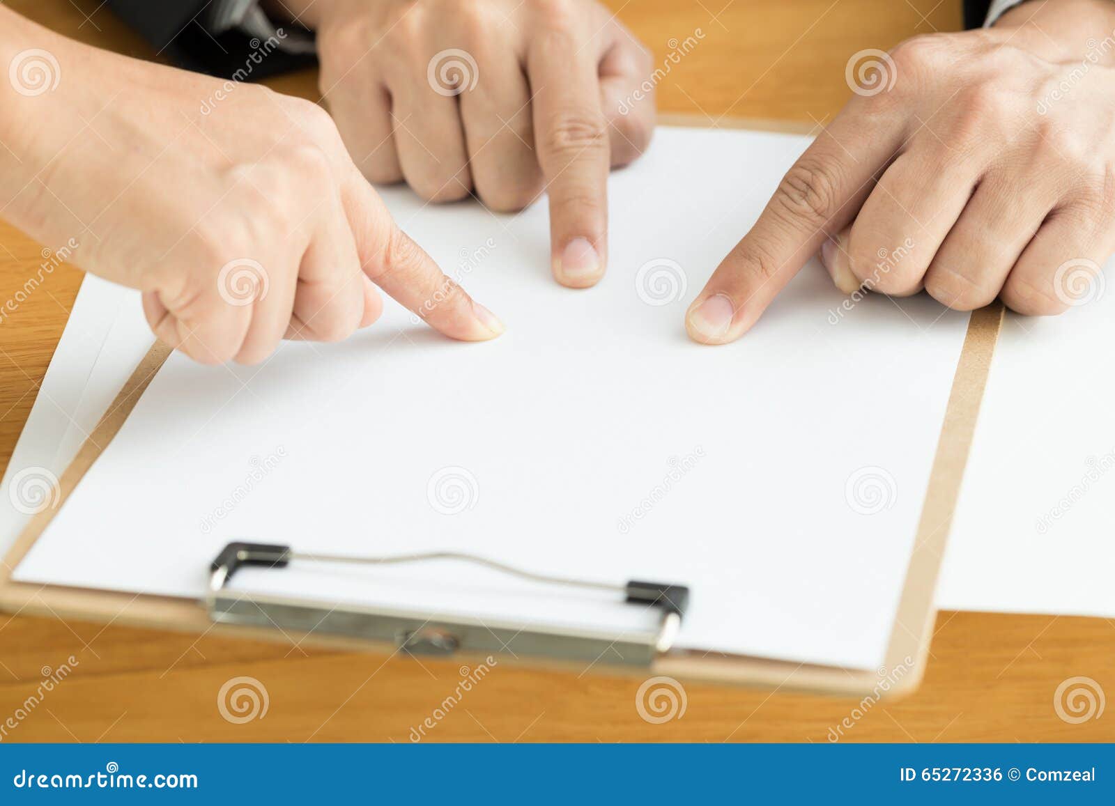 Human Hand Pointing White Paper on Wood Desk Stock Photo - Image of ...