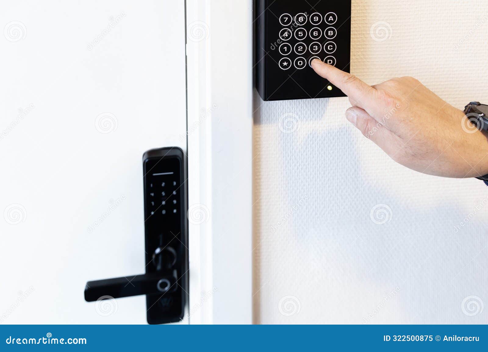 A Human Hand Presses Buttons with Numbers To Enter a Code To Open the ...