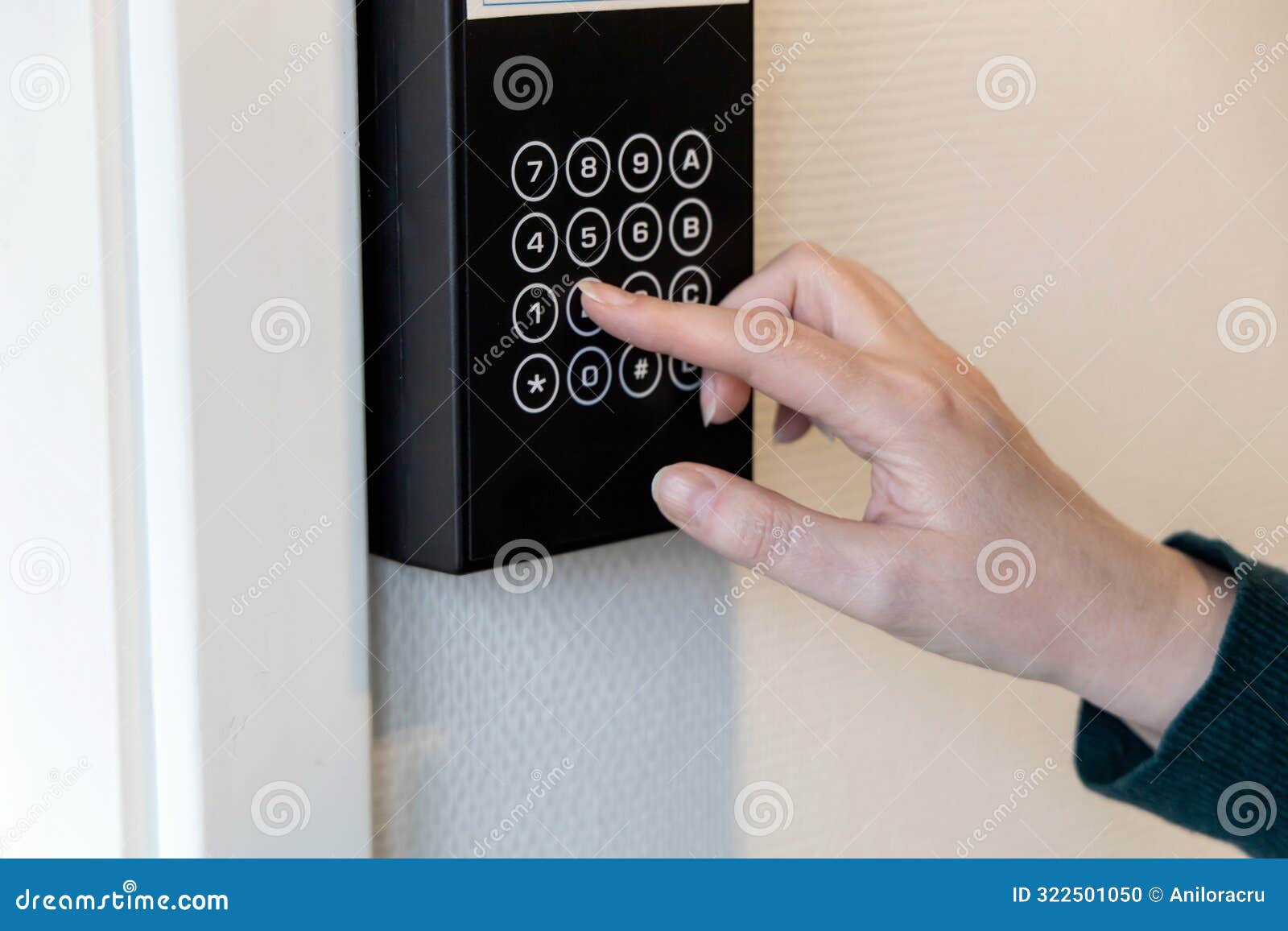 A Human Hand Presses Buttons with Numbers To Enter a Code To Open the ...