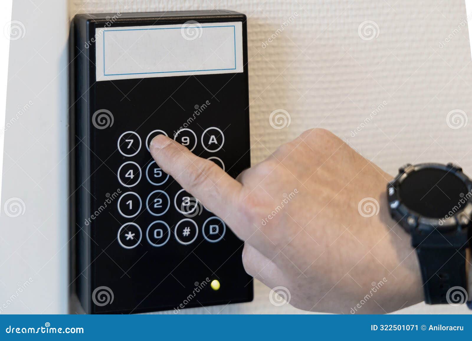A Human Hand Presses Buttons with Numbers To Enter a Code To Open the ...
