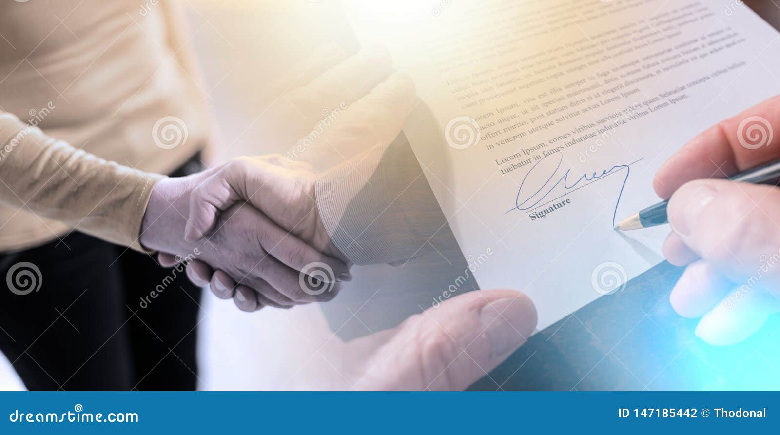Signing of a Contract and Handshake; Multiple Exposure Stock Photo ...