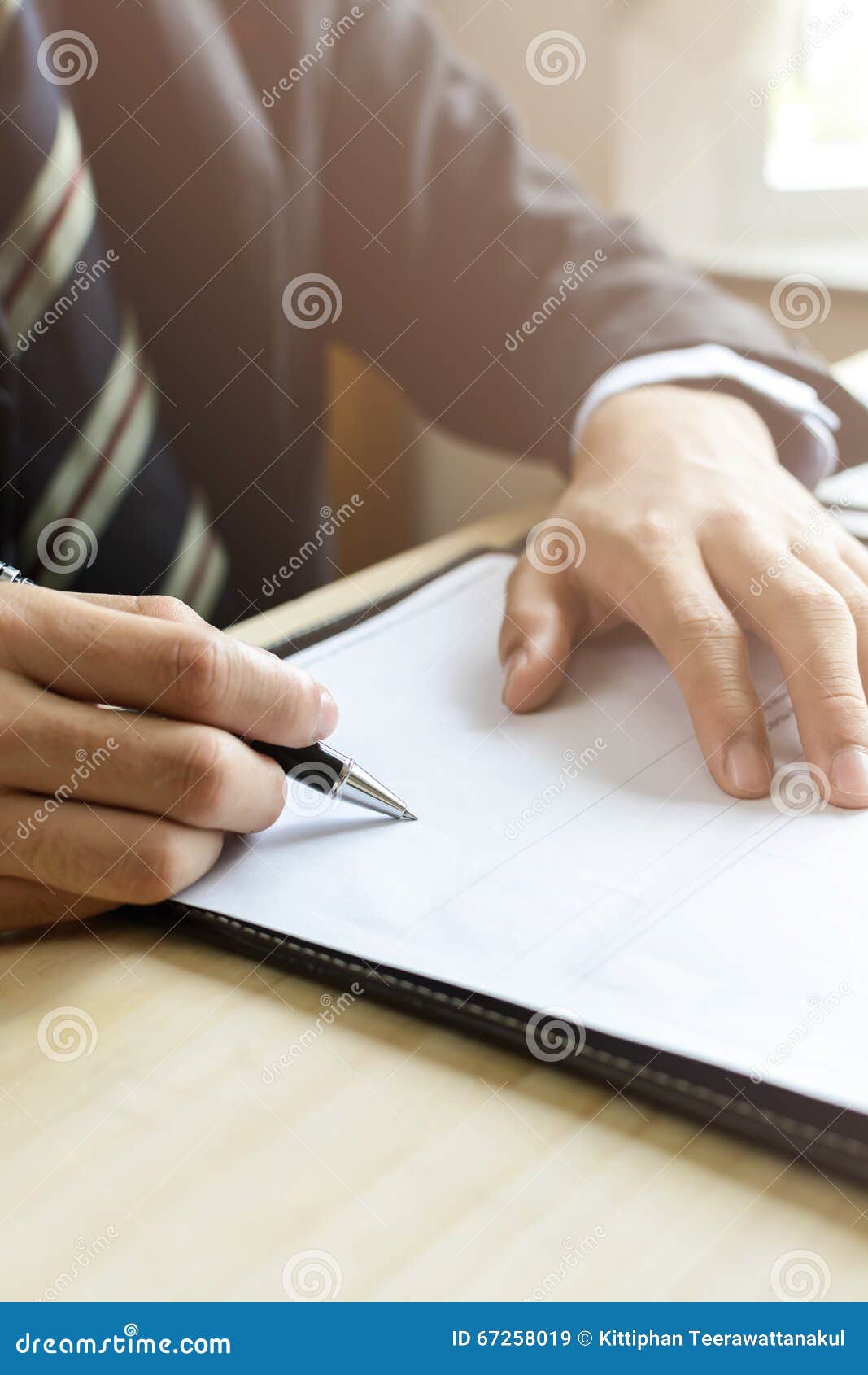 Human Hand Signing on Formal Paper at the Workplace Stock Image - Image ...