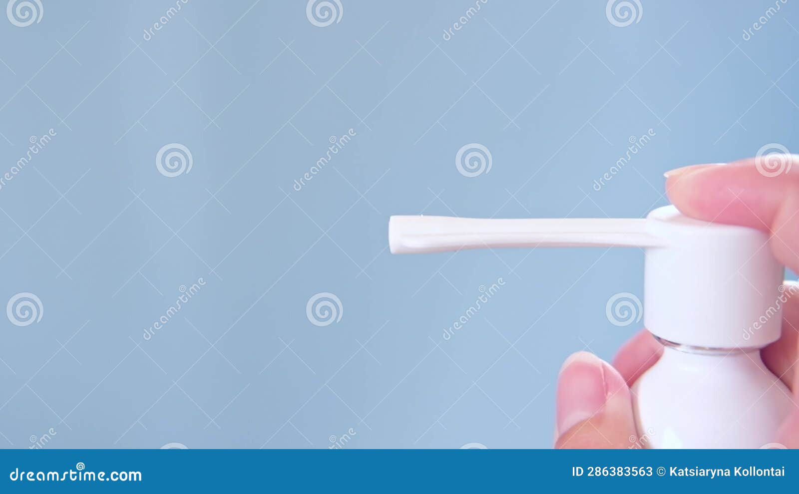 Human Hand Spraying Throat Flu Spray from Dispenser on Blue Background ...