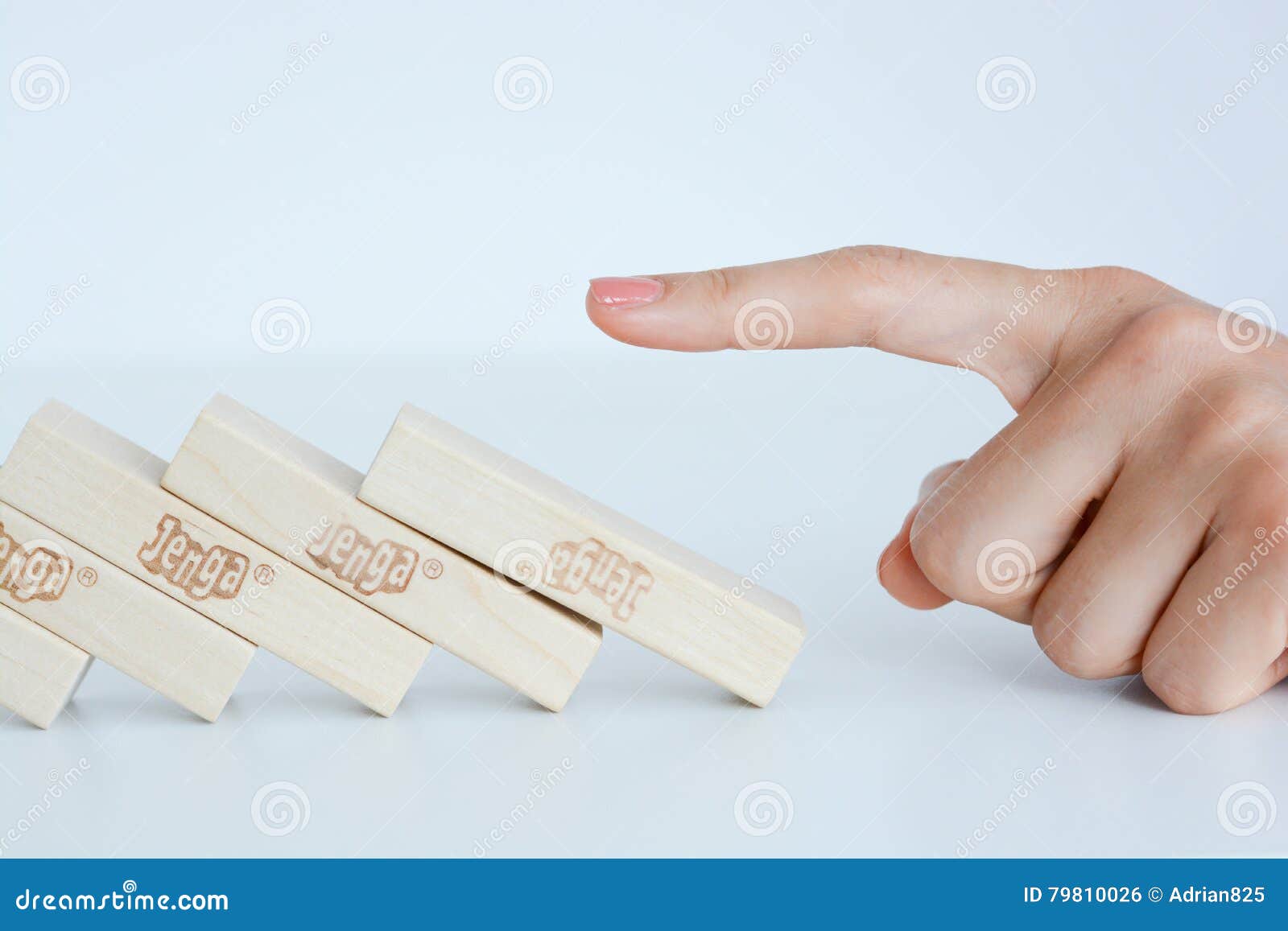 Human Hand Starting a Domino Effect Concept Stock Photo - Image of ...