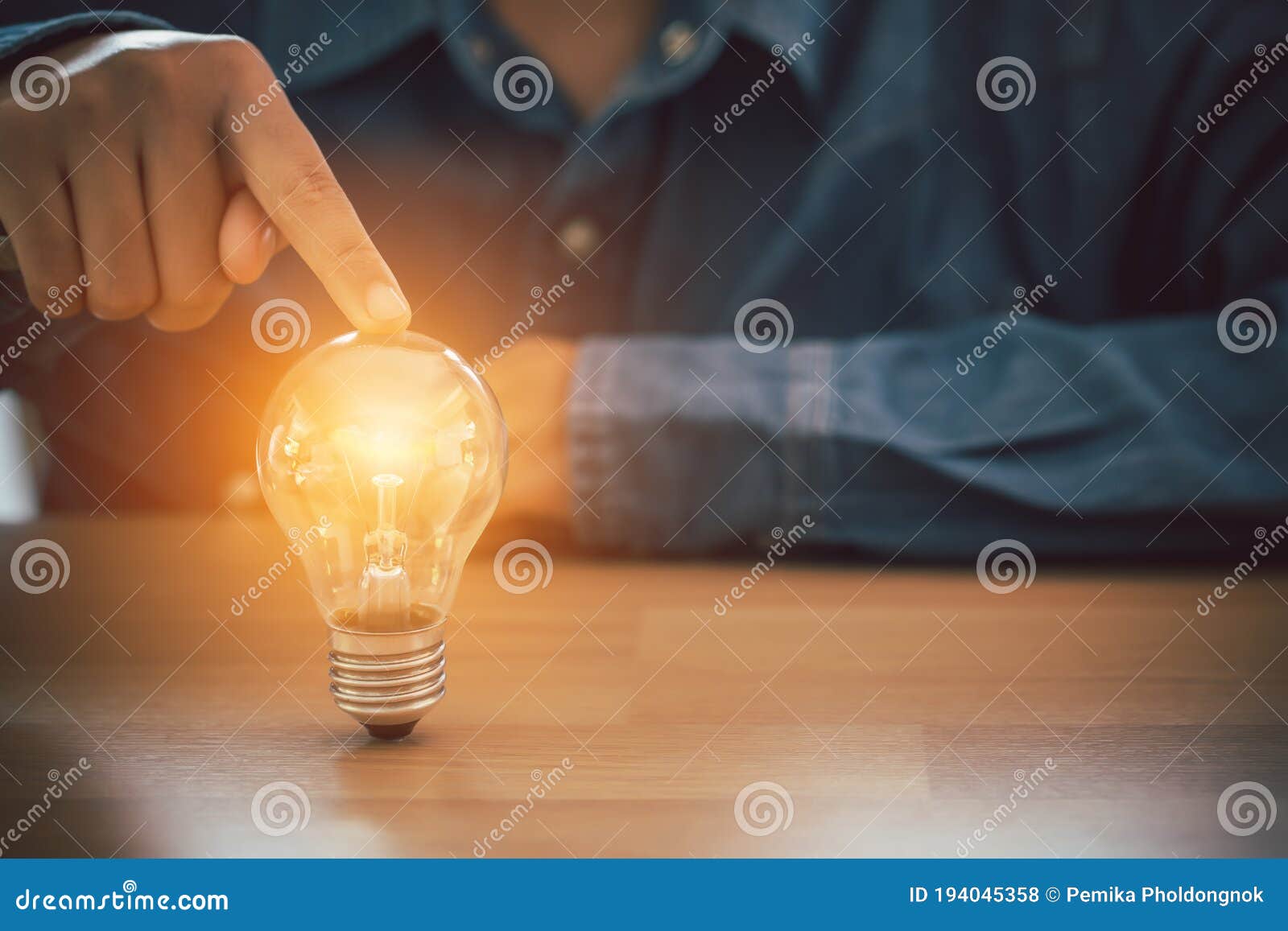 Human Hand Touch Light Bulb. Business, Innovation and Creative Design ...