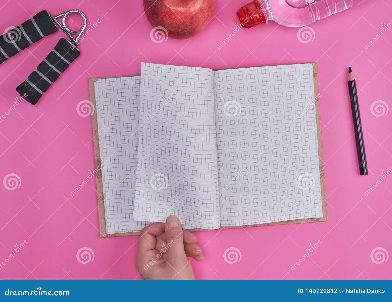 Human Hand Turns Over a Notebook with Empty Sheets Stock Photo - Image ...