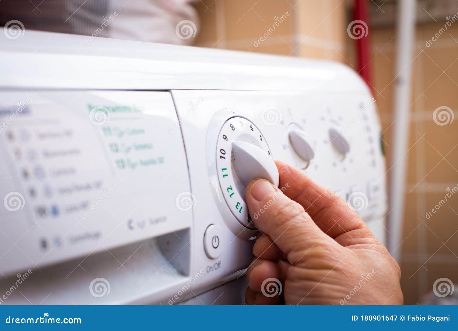 Human Hand Using Knob on Home Washing Machine Control Panel Stock Image ...