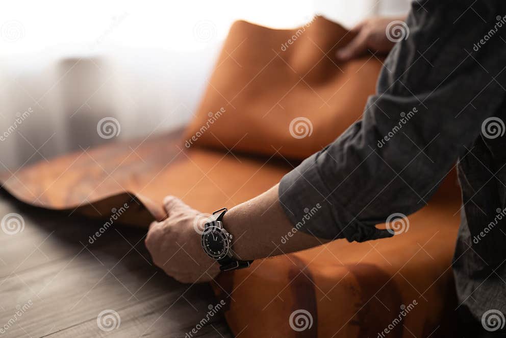 Human Hands Holding Brown Leather Stock Image - Image of leather ...
