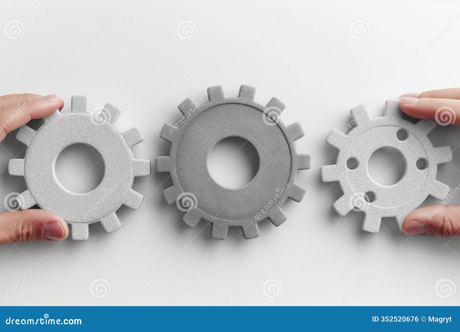 Human Hands Holding Metallic Gears in a Collaborative Concept. System ...