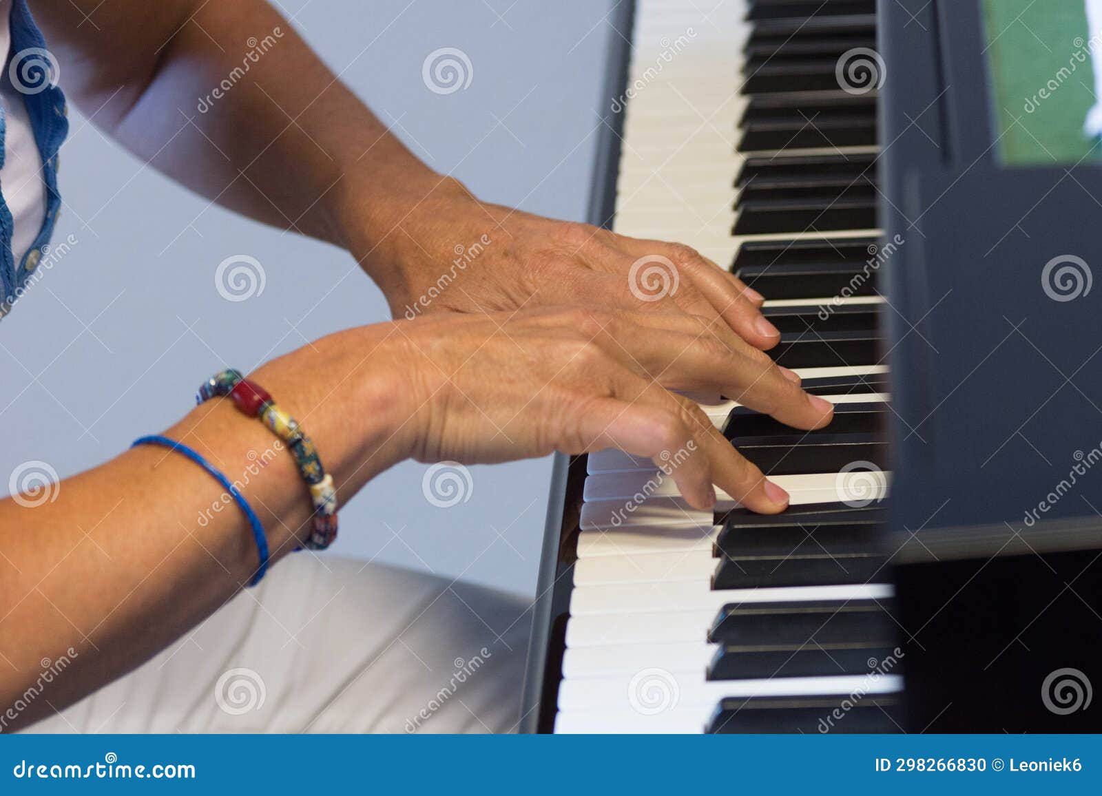 Human Hands Playing the Keys Notes and Chords on a Classic Black Piano ...