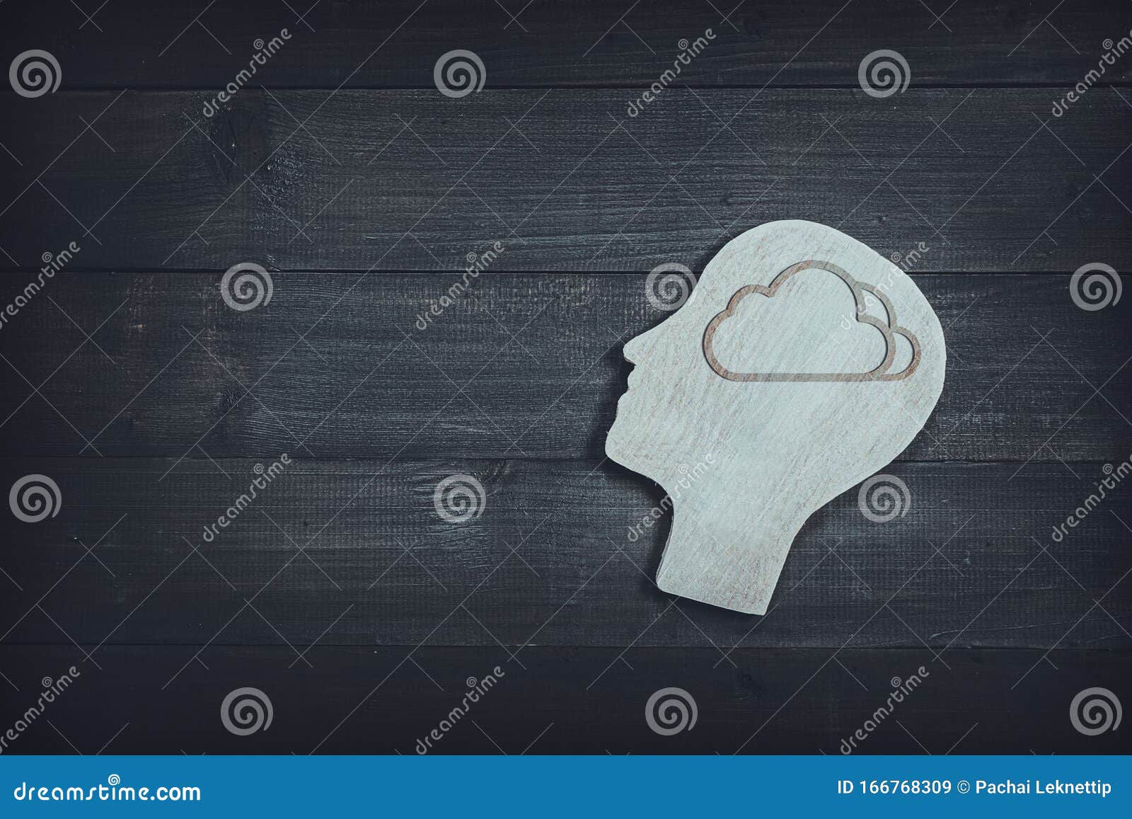 Human Head and Face with Cloud Sign on Wood Table Background. Brain of ...
