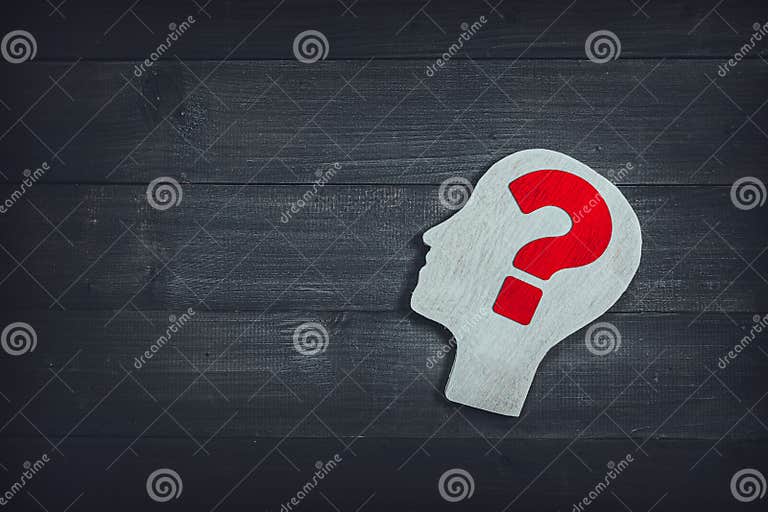 Human Head and Face with Red Question Mark Sign on Wood Table ...
