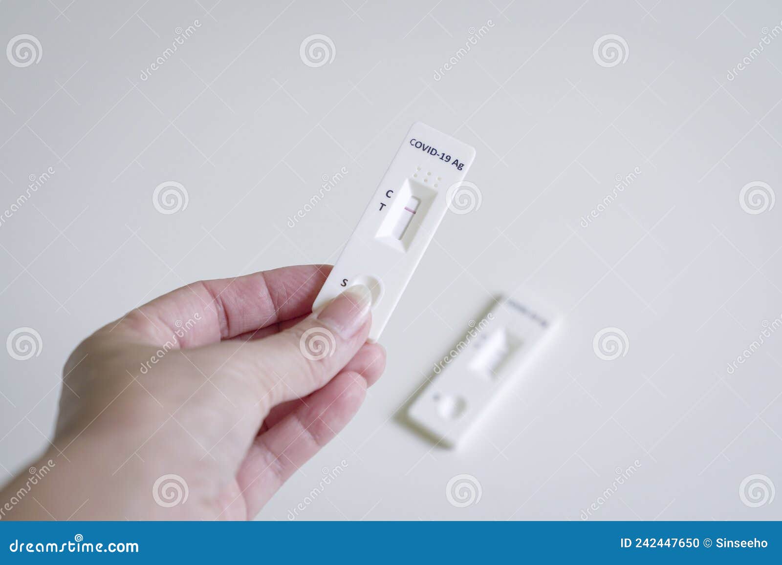 Human Holding Covid-19 RTK Antigen Rapid Test Result Stock Photo ...