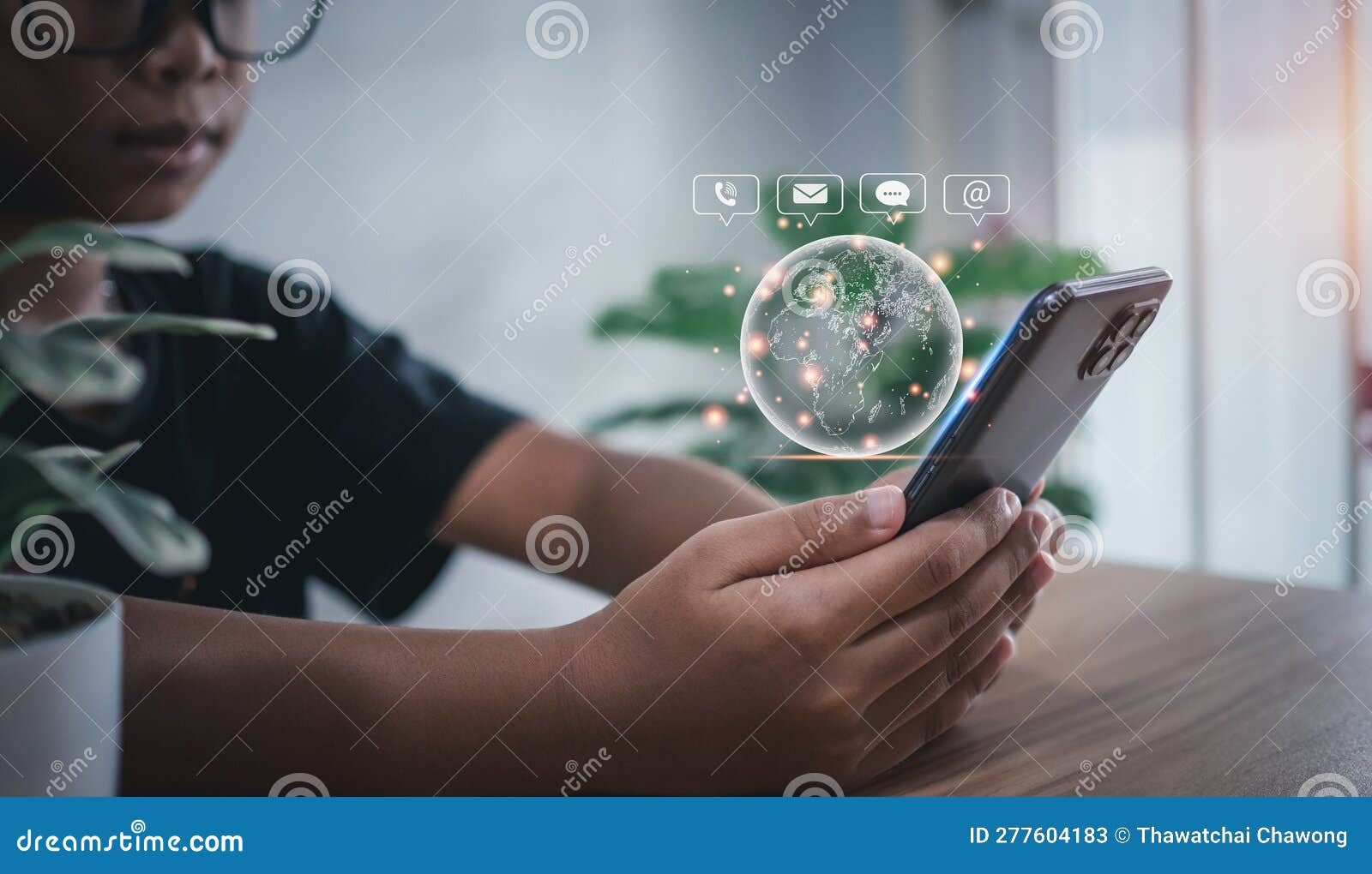 Human Holding a Phone with Communication Icons Represents a Global ...