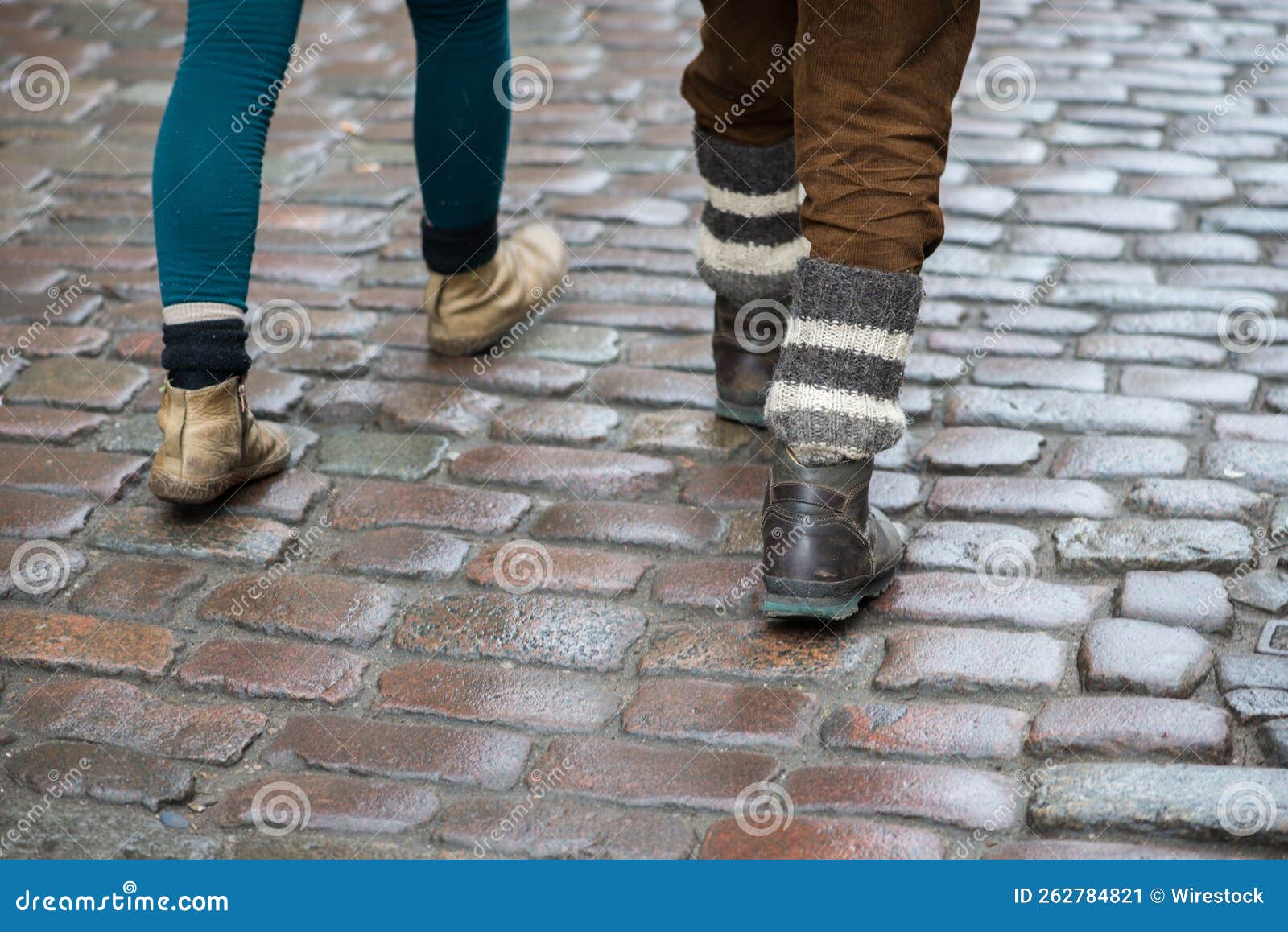 Human Legs in Warm Boots Walking through the Streets of the City Stock ...