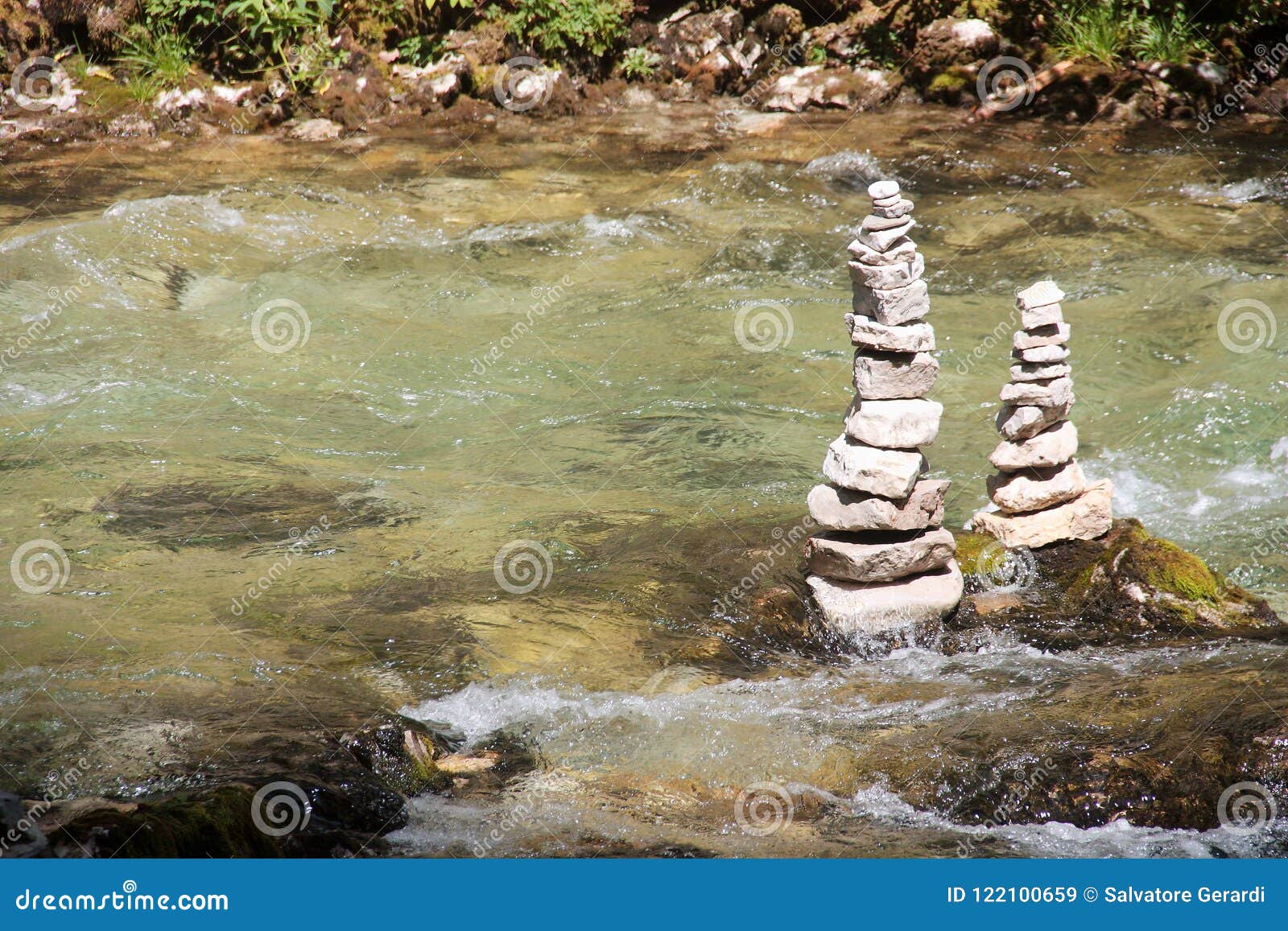 Human Made Piles of Stones Near a River Stock Image - Image of stack ...