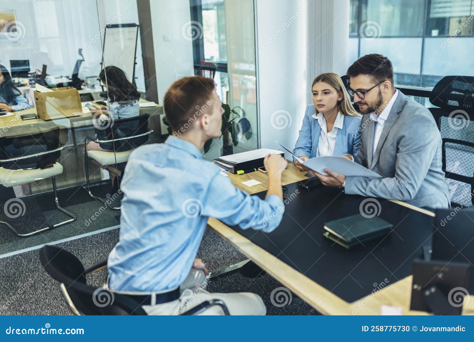 Human Resource Team Talking To a Candidate during a Job Interview in ...