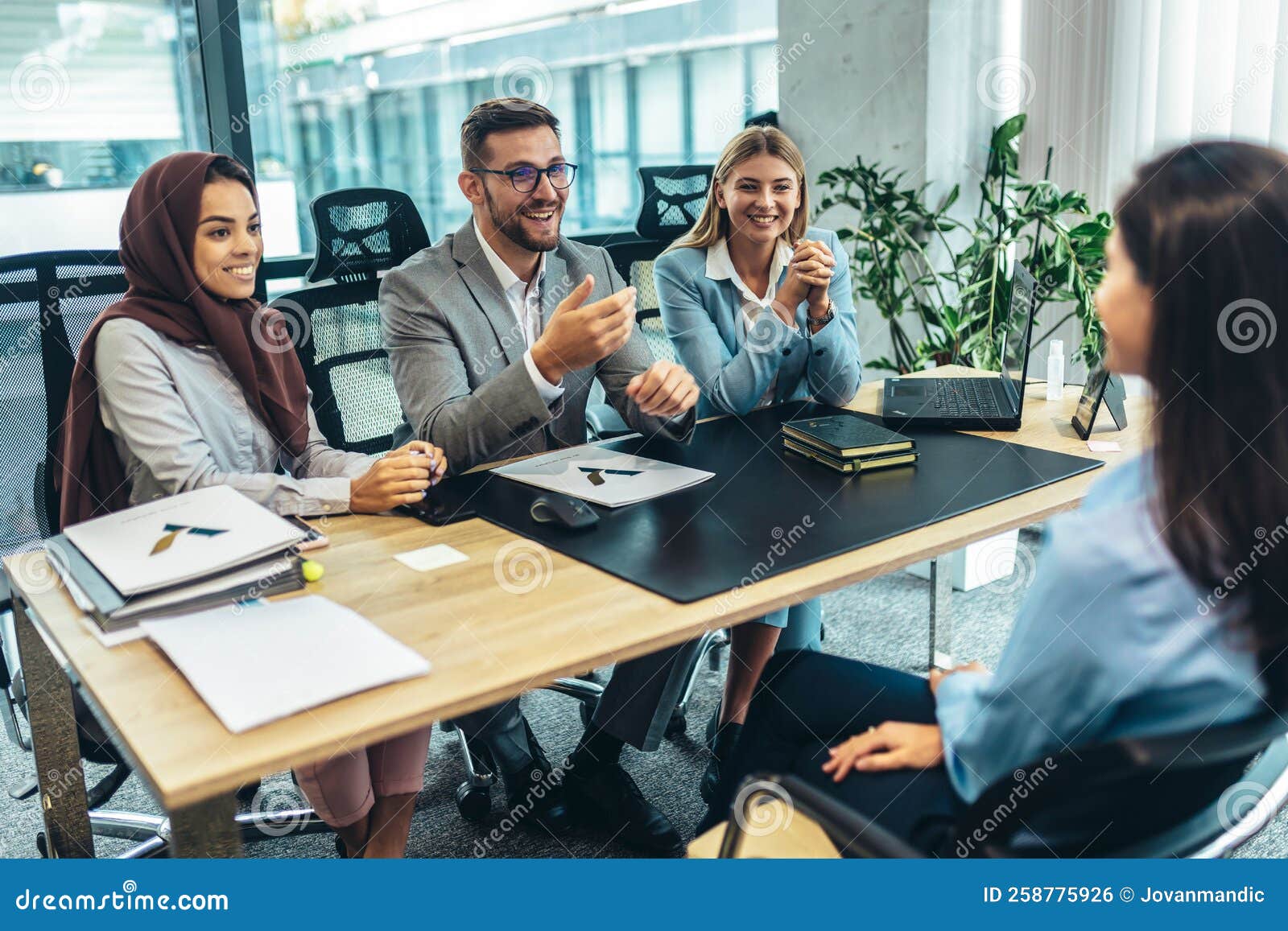 Human Resource Team Talking To a Candidate during a Job Interview in ...