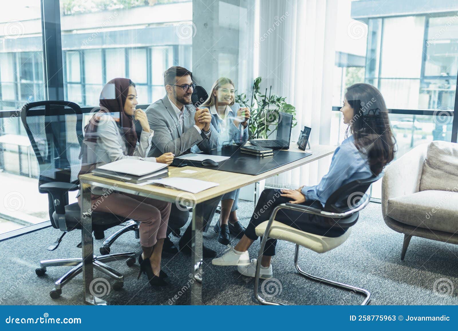 Human Resource Team Talking To a Candidate during a Job Interview in ...