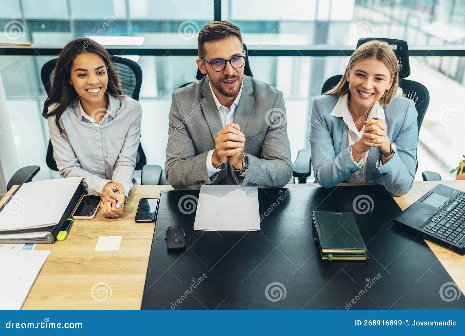 Human Resource Team Talking To a Candidate during a Job Interview in ...