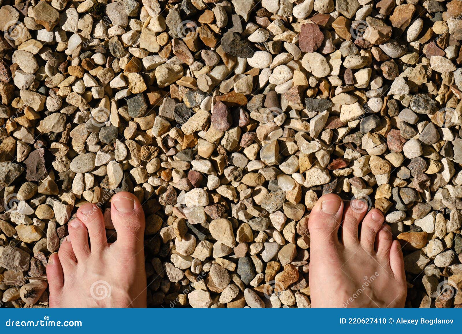 Human& X27;s Feet Standing on Pebbles Stock Photo - Image of rough ...