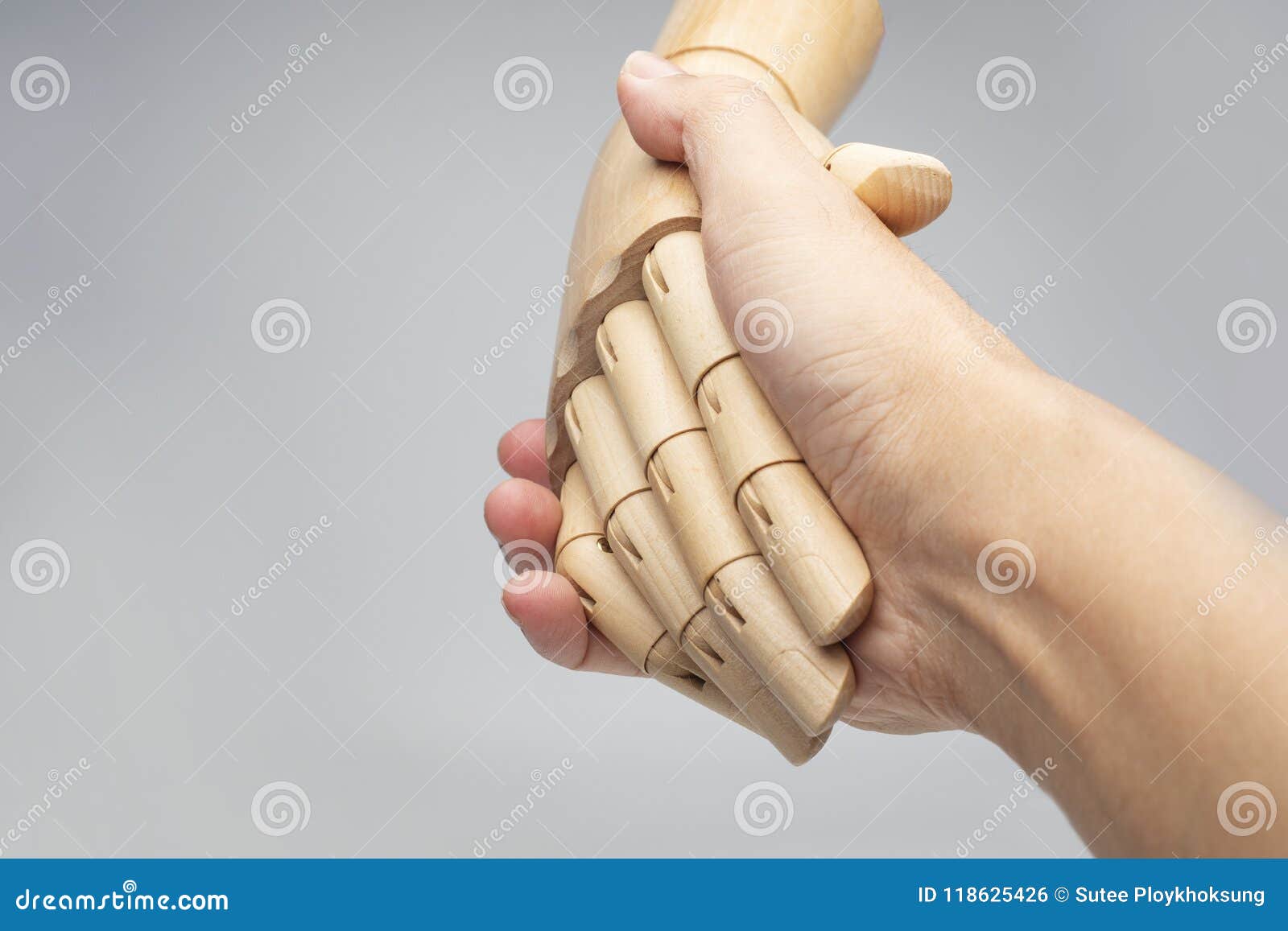 Human shaking robot hands stock photo. Image of robot - 118625426