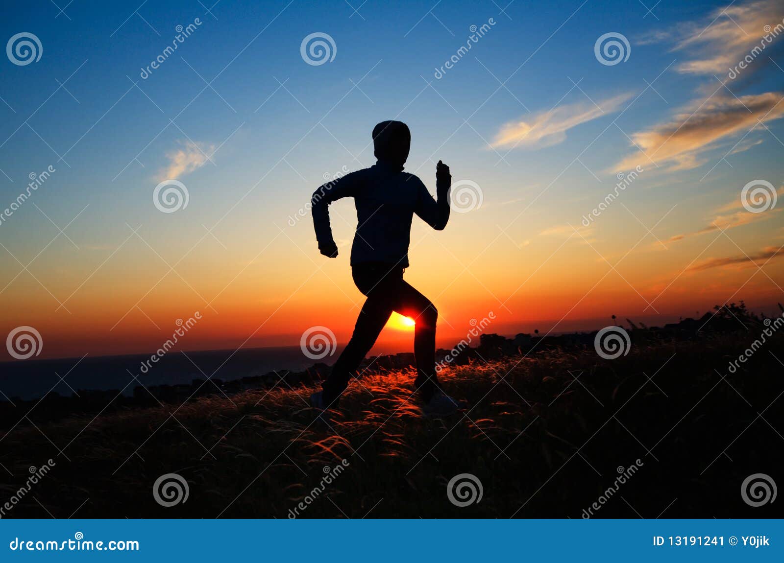 Human Silhouette Against Sunset Stock Image - Image of grass, scenery ...