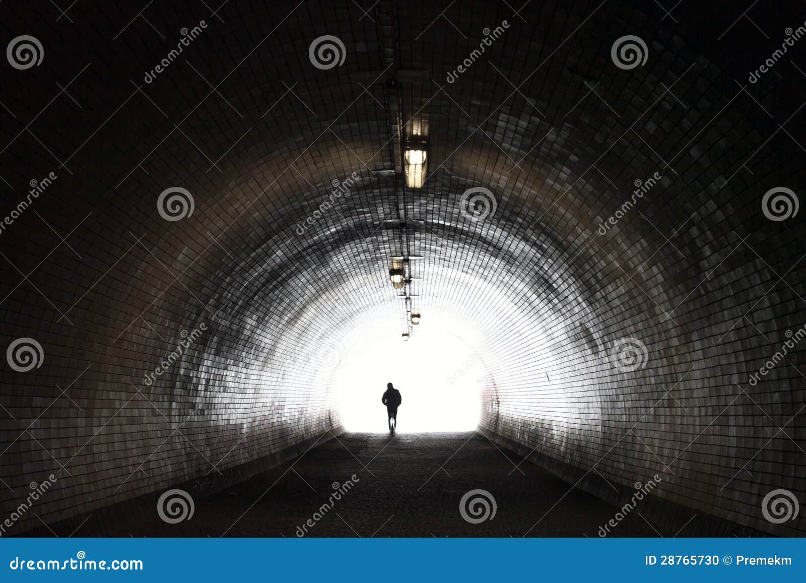 Human Silhouette in Light at the End of the Tunnel Stock Photo - Image ...