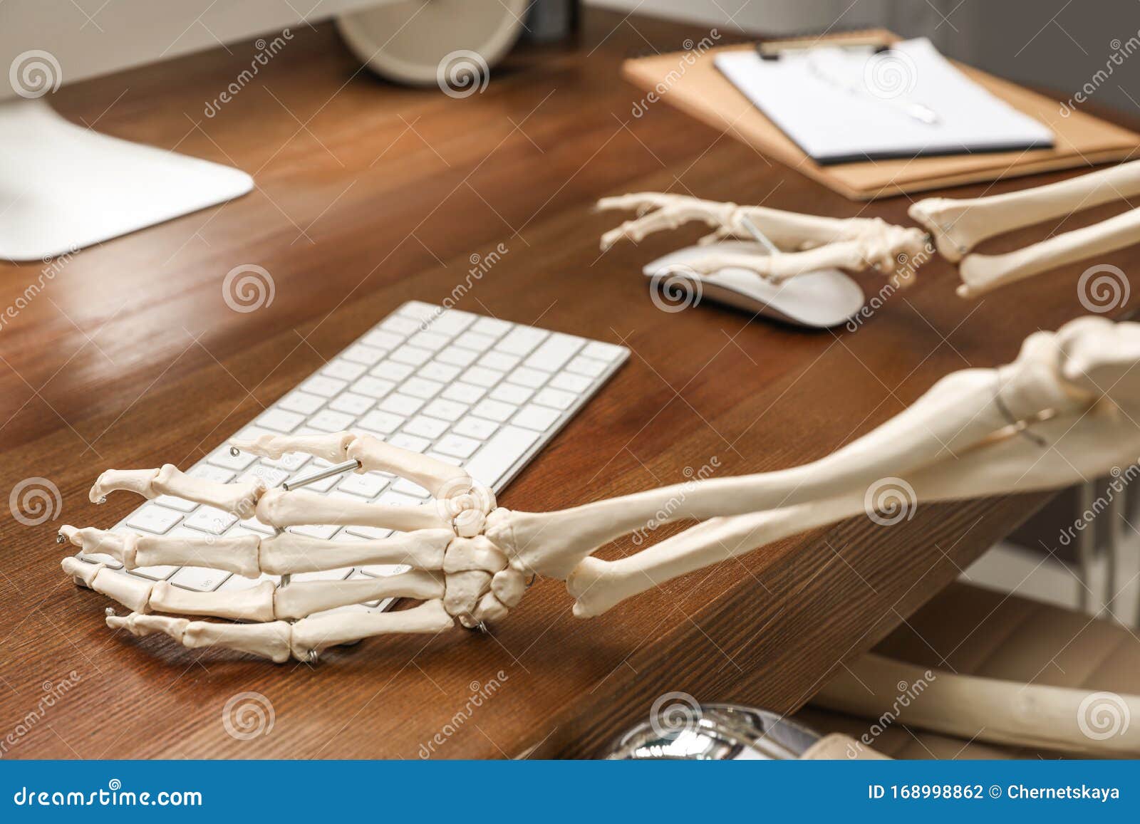 Human Skeleton at Table in Office Stock Photo - Image of bone, scary ...
