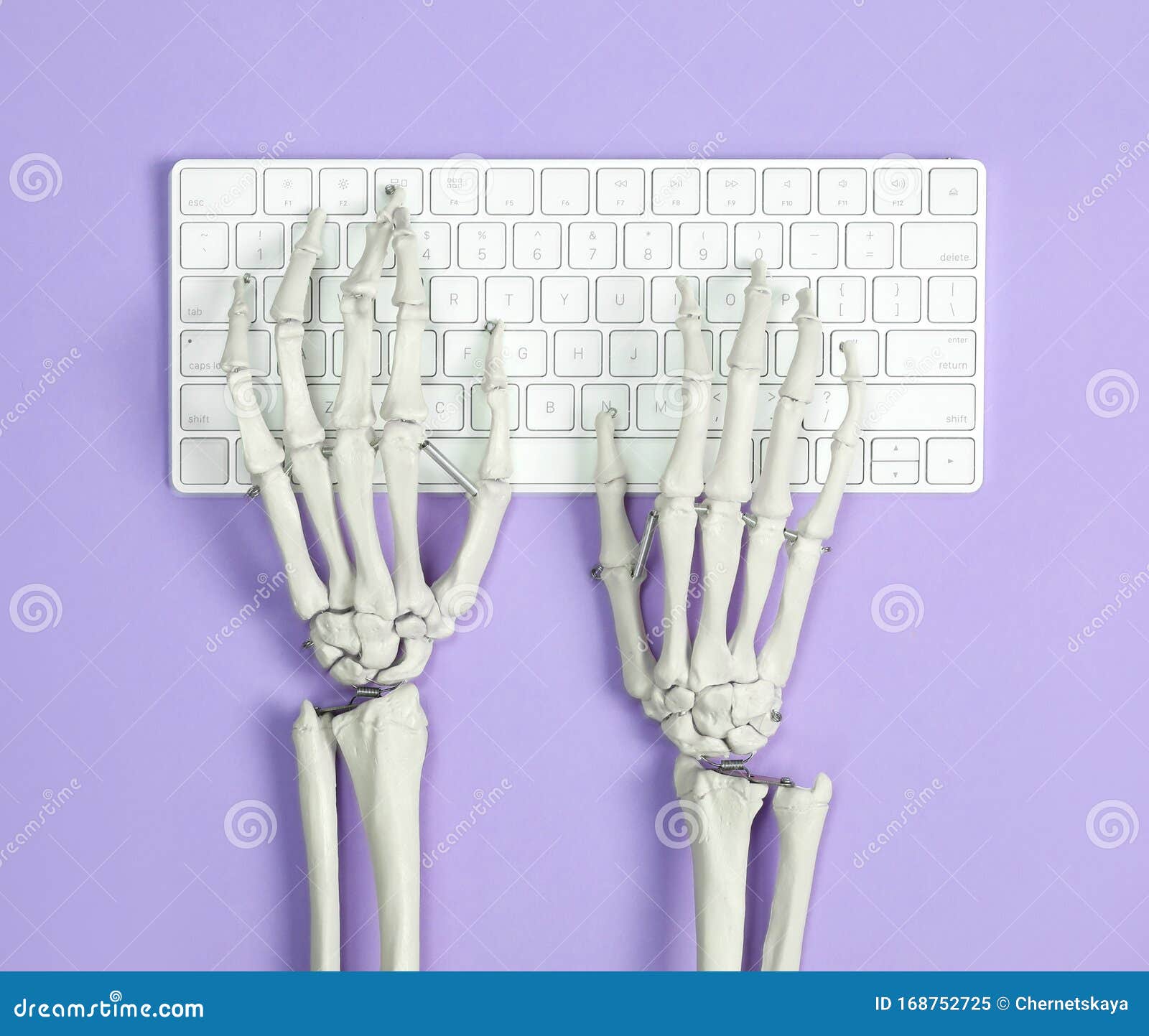 Human Skeleton Using Computer Keyboard on Background, Top View Stock ...