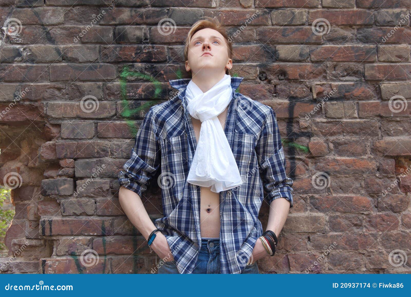The Human is Standing Near Red Brick Wall Stock Photo - Image of ...