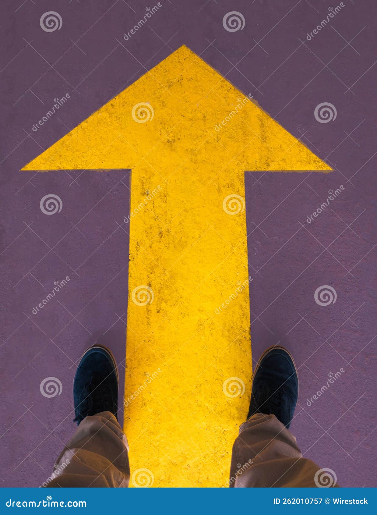 Human Standing on a Yellow Arrow Sign Stock Image - Image of direction ...
