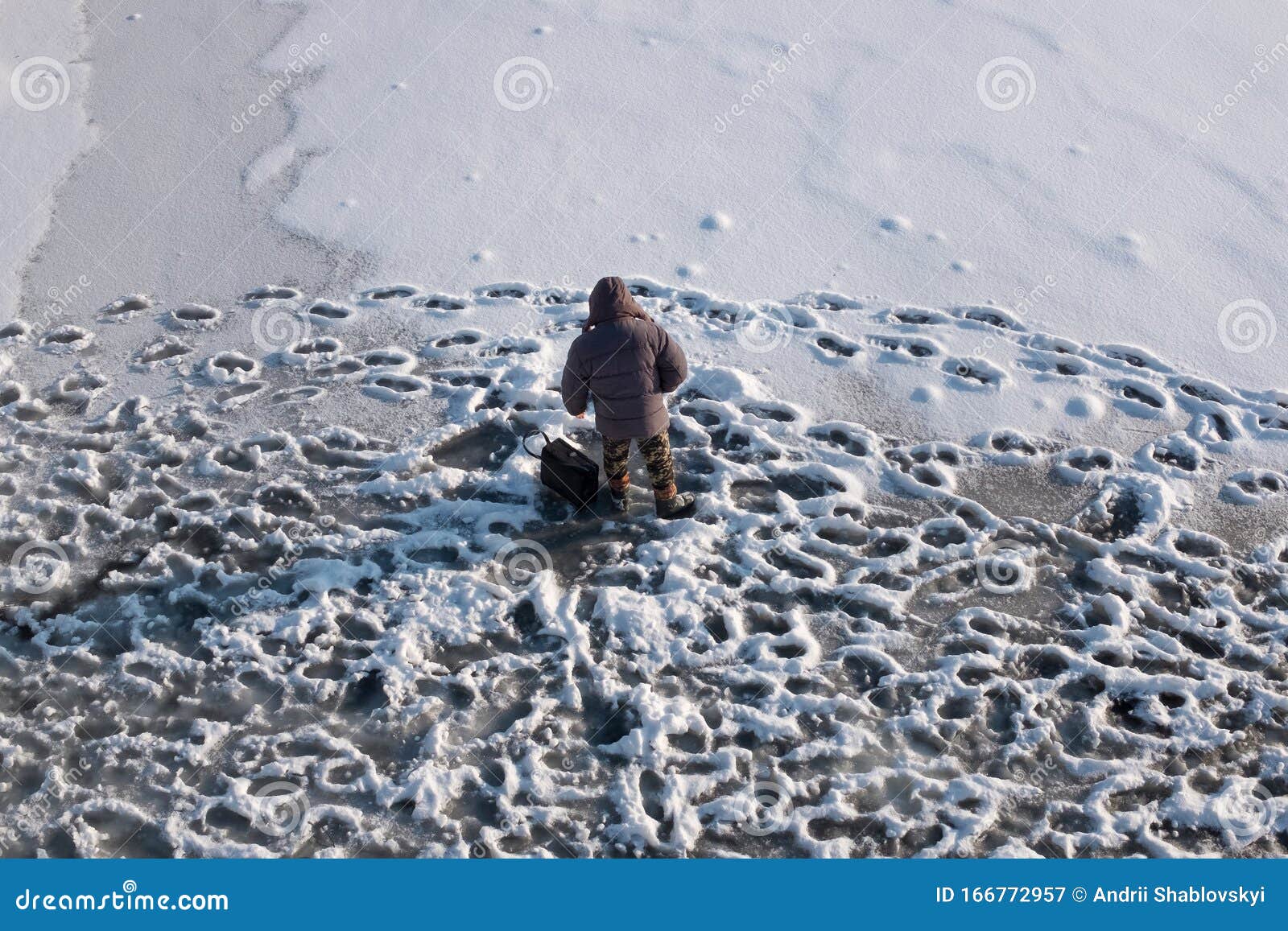 Human Traces in the Snow and a Fishman. Stock Image - Image of fishing ...