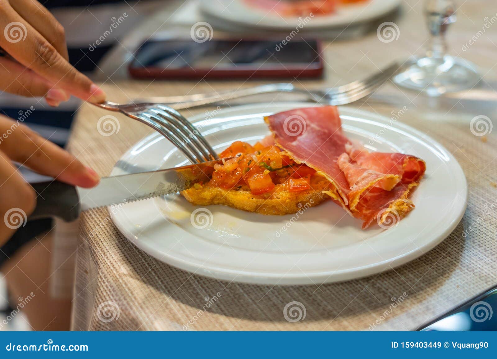 Human Using Knife and Fork while Having Dinner with Bacon Stock Image ...
