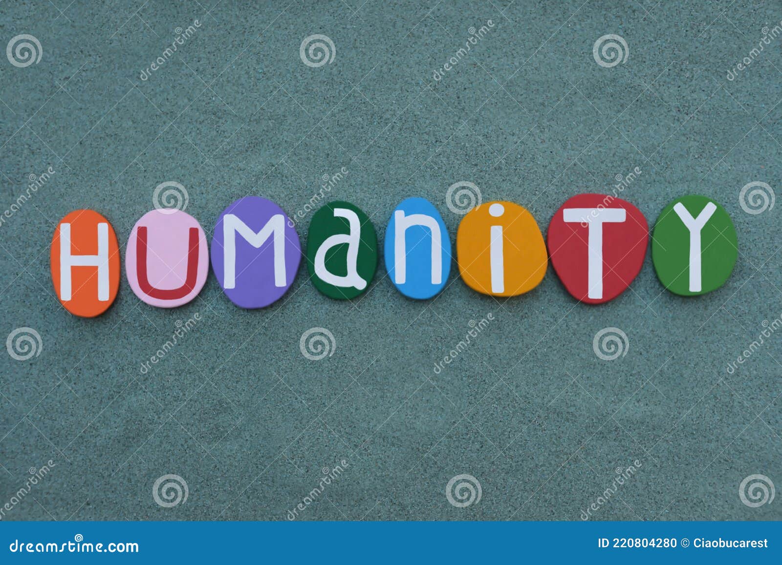 Humanity, Creative Text Composed with Multi Colored Stone Letters Over ...