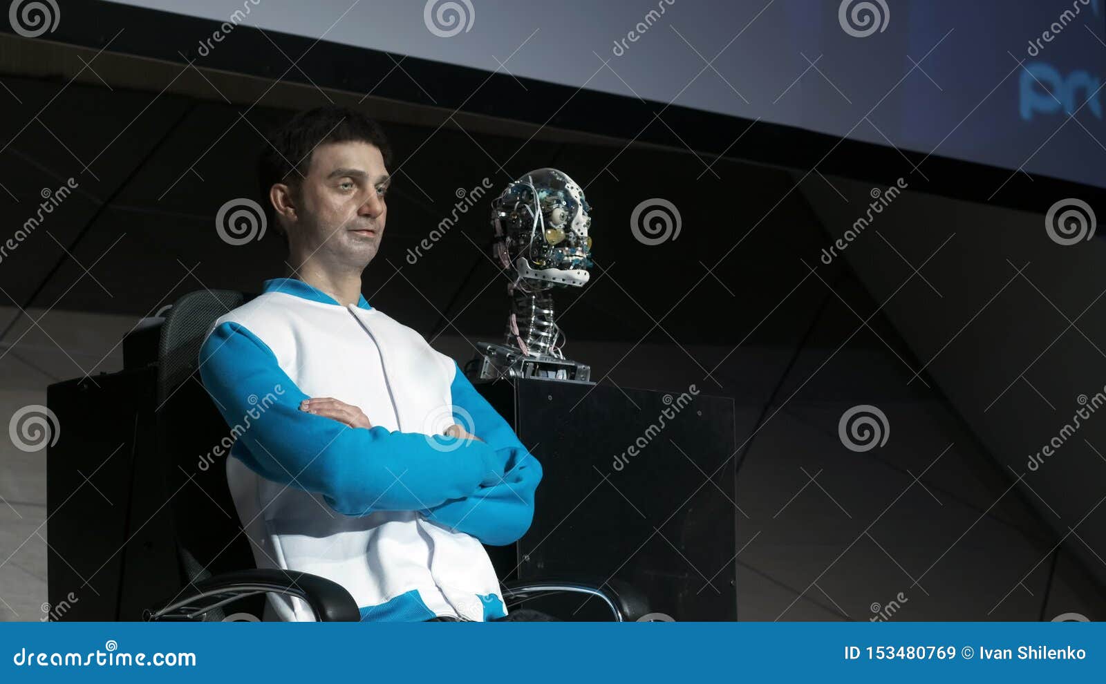 Humanoid Robot Man on Stage. Innovative Development in Robotics and ...