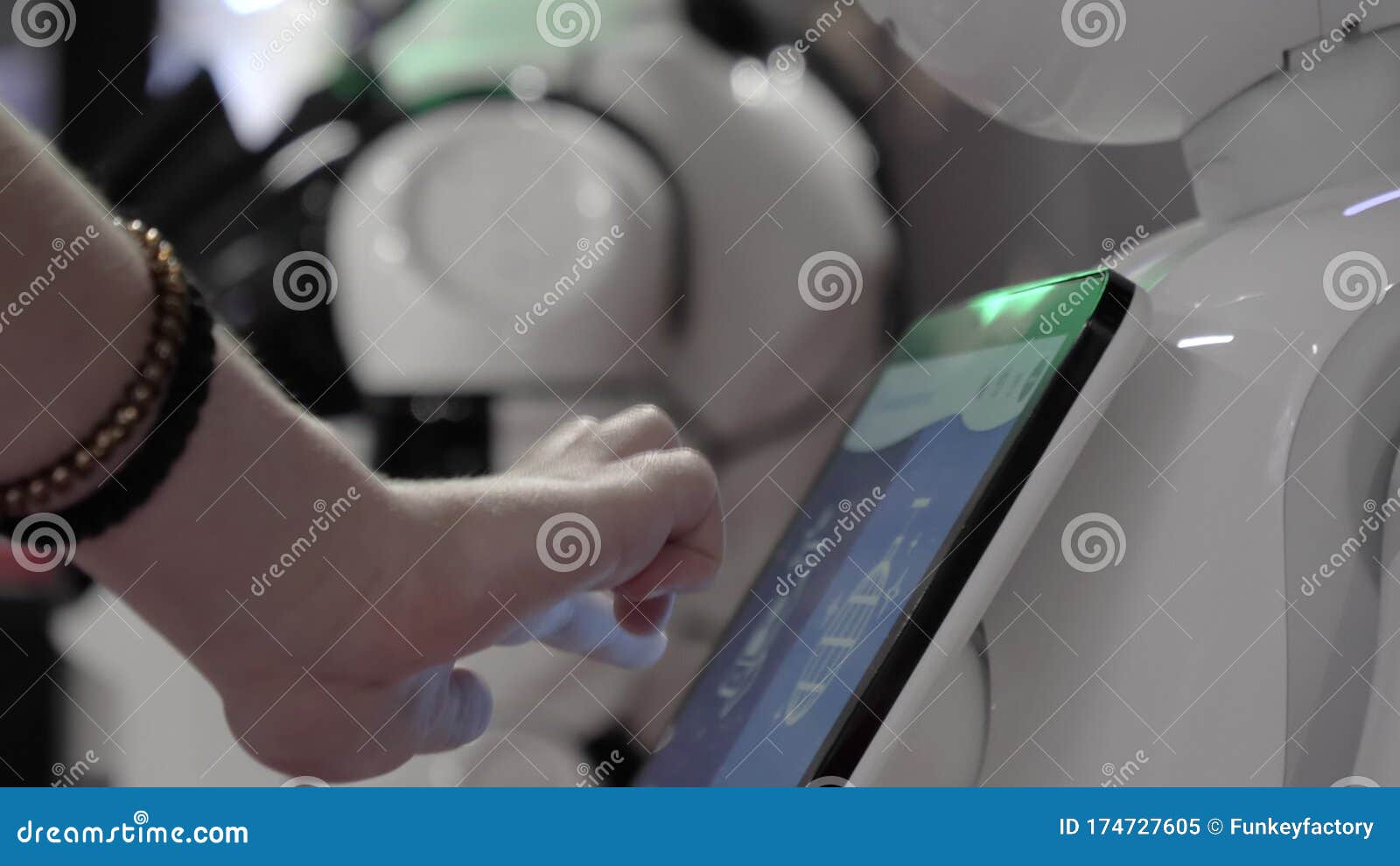 The Humanoid Robot with Touchscreen. Woman Using Touchscreen on a Robot ...