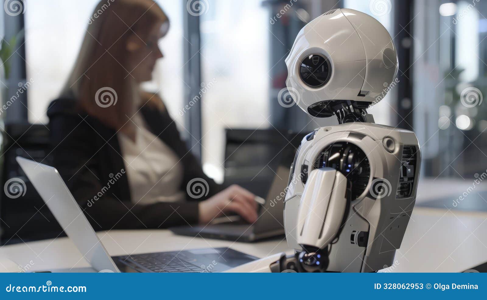 Humanoid Robot Working Alongside Human in a Modern Office. AI and ...