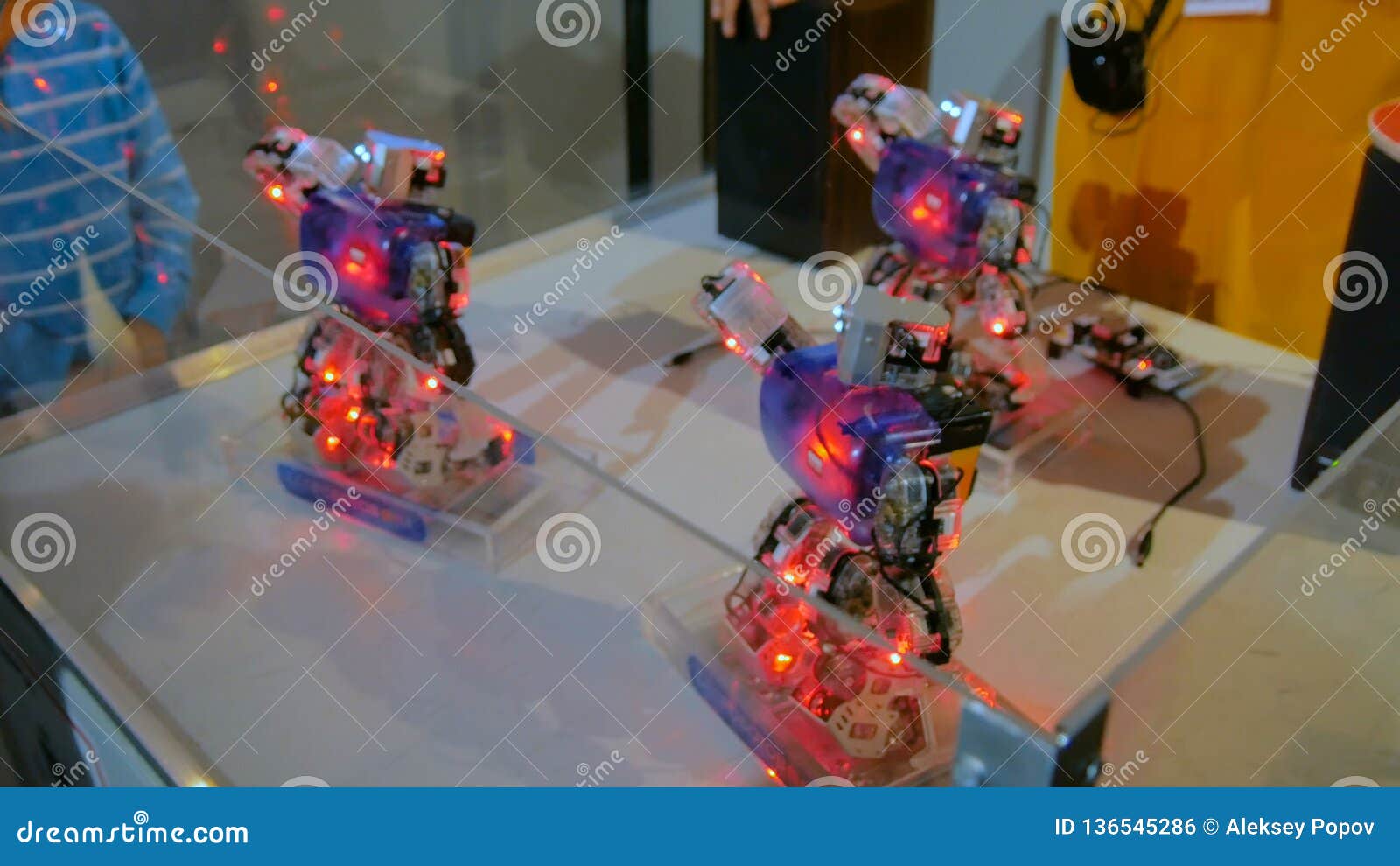 Humanoid Robots Dancing at Robotic Show Stock Photo - Image of ...